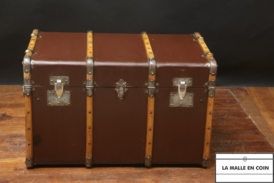 Brown curved steamer trunk